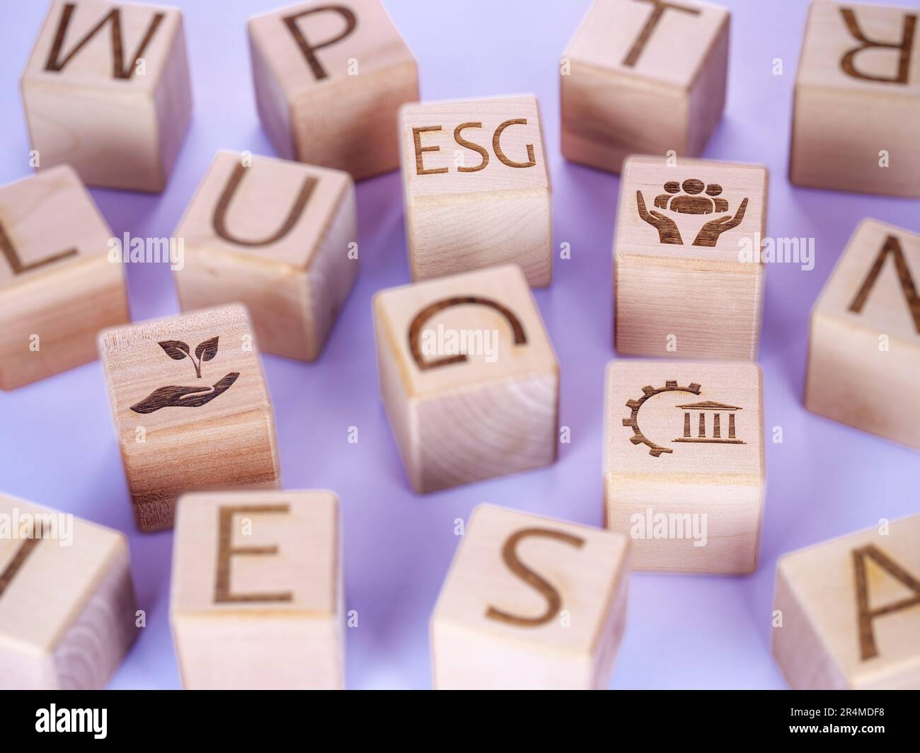 ESG symbols on wooden cubes as a concept of corporate business ...