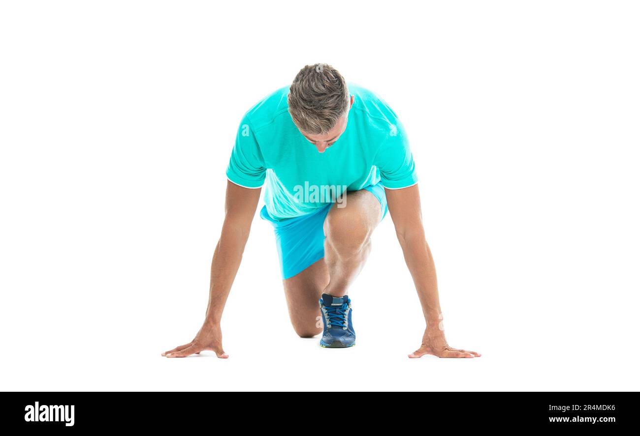 concentrated runner getting ready to start training into action. runner ...