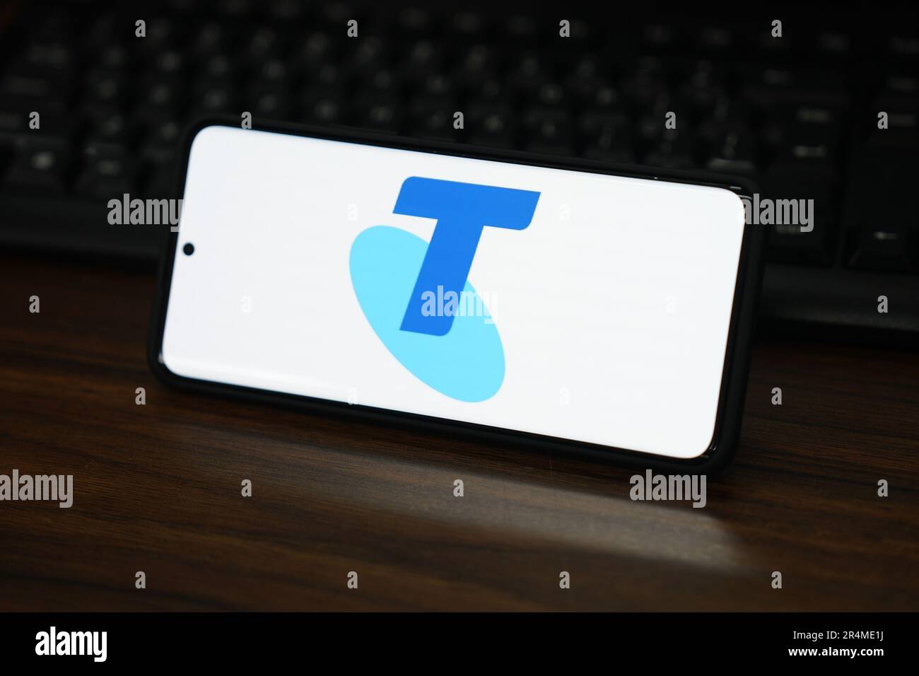 In this photo illustration, the Telstra logo is displayed on the screen ...
