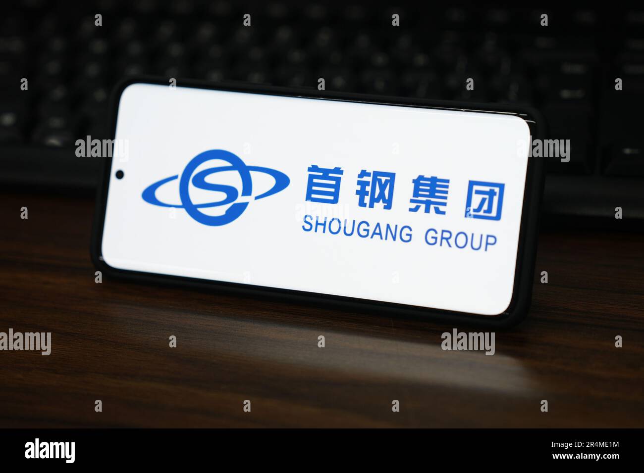 In this photo illustration, the Shougang Group logo is displayed on the ...