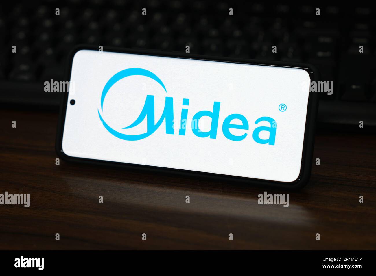 In this photo illustration, the logo of Midea Group is displayed on the ...