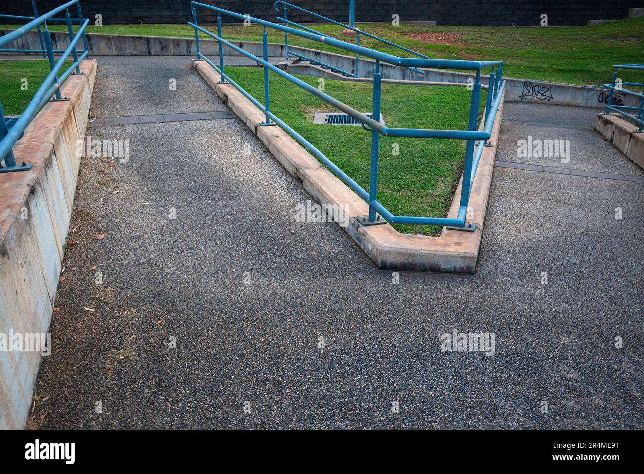 a photograph of the angled walking path leading to the palmerston city ...