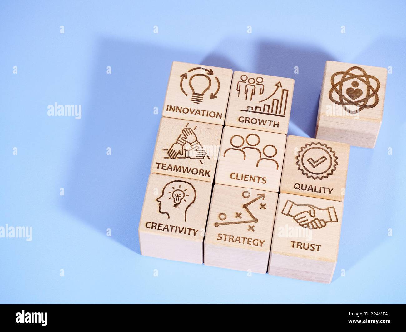 Symbols of core corporate values on wooden cubes Stock Photo - Alamy