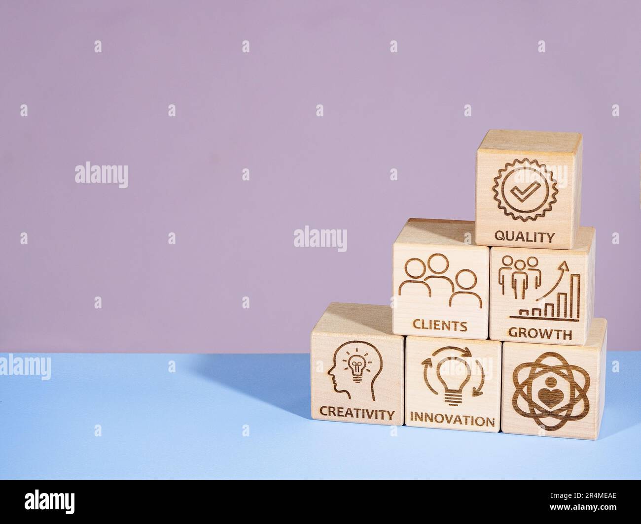 Core corporate values in the form of symbols on wooden cubes Stock ...
