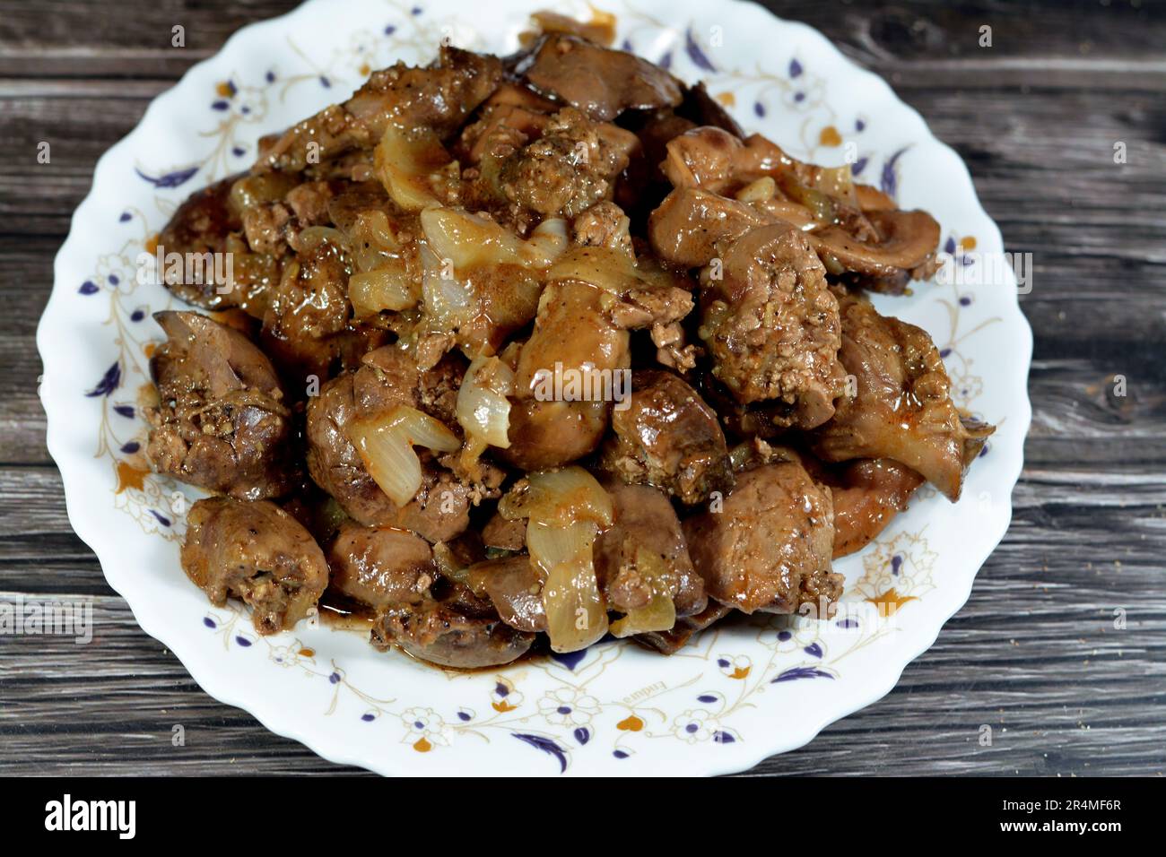 cooked chicken livers, gizzards and hearts, selective focus of fresh ...