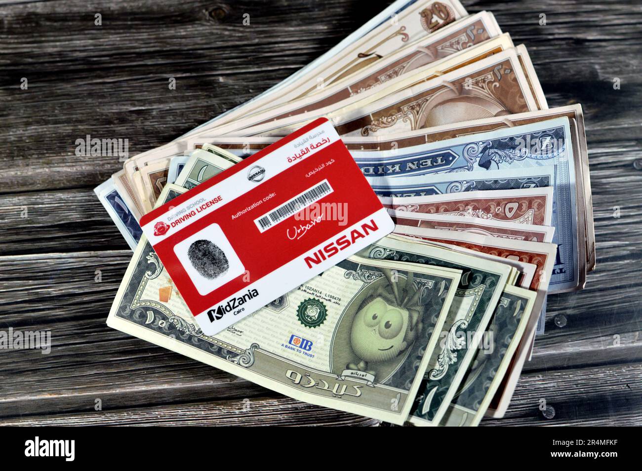 Cairo, Egypt, May 26 2023: KidZos money, Driving license of KidZania, a ...