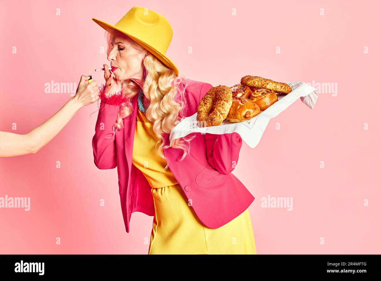 Portrait of attractive, stylish, senior woman in colorful clothes ...