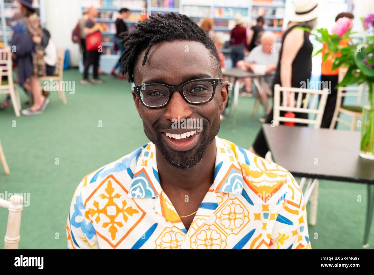 Author writer Jeffrey Boakye signing books in the book shop at the Hay ...