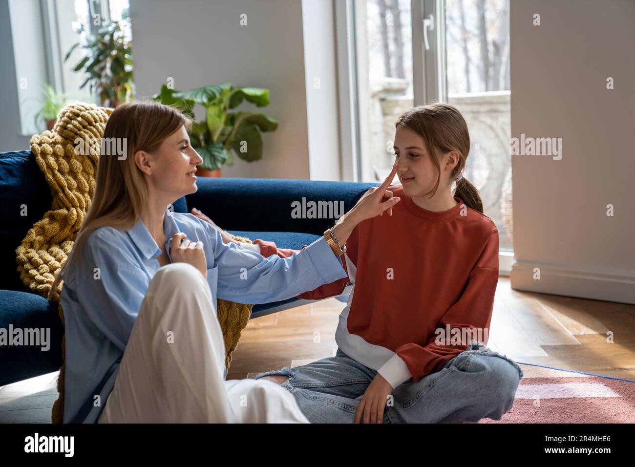 Happy American foster mother talk share secrets having fun together ...