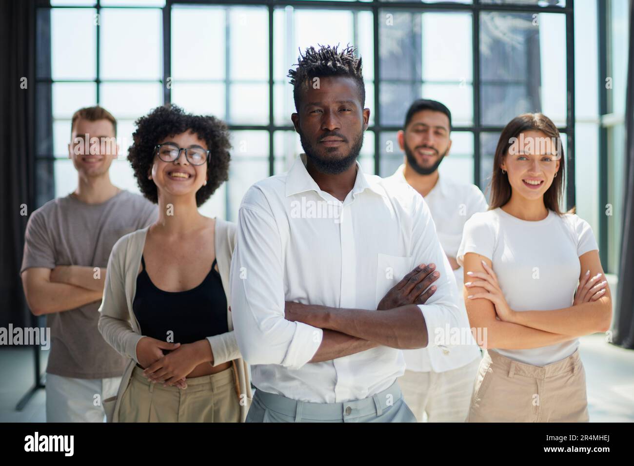 Smiling professional business leaders and employees group team portrait ...