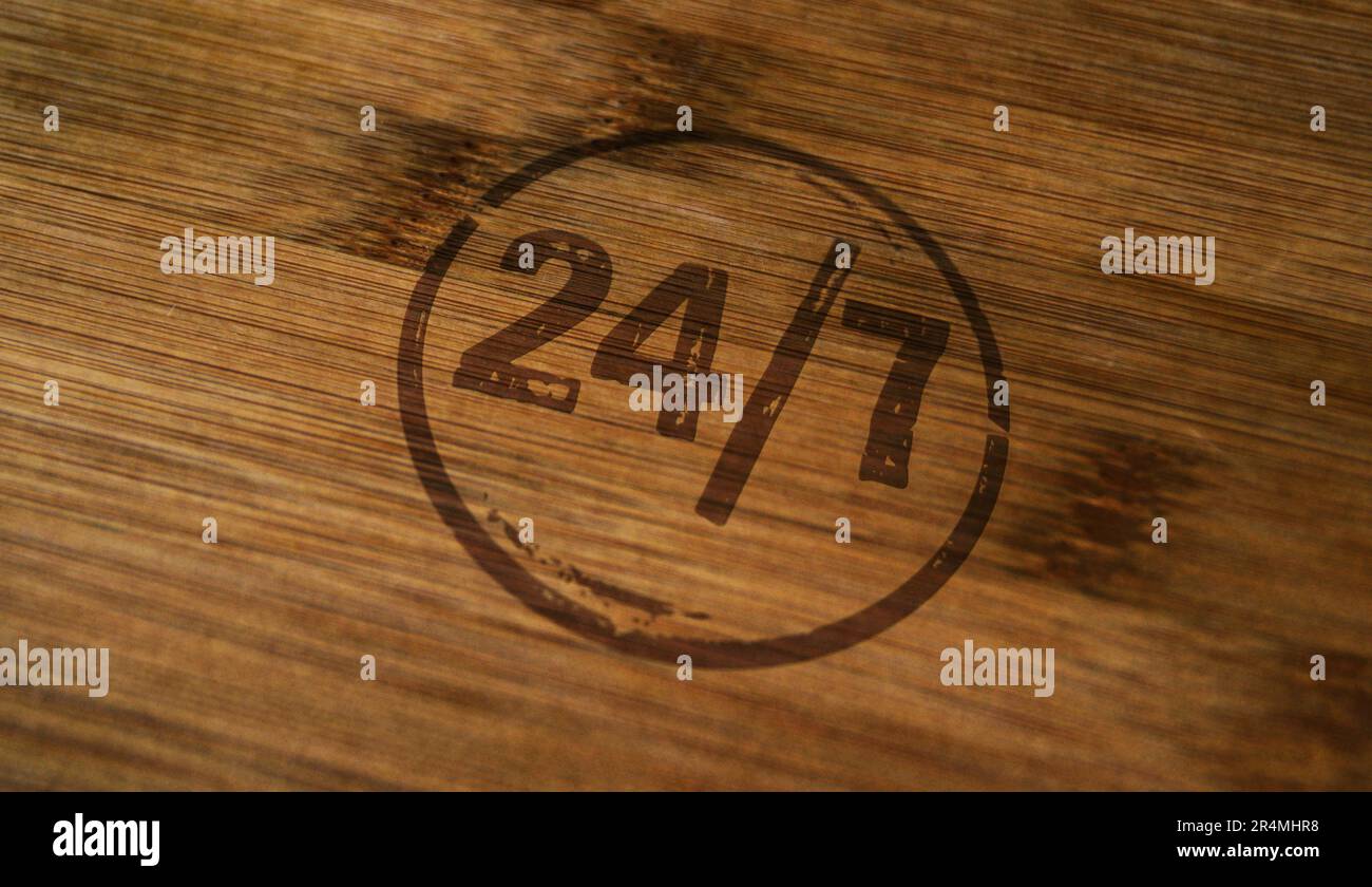 24 by 7 24 hour a day service stamp printed on wooden box. 24h round ...