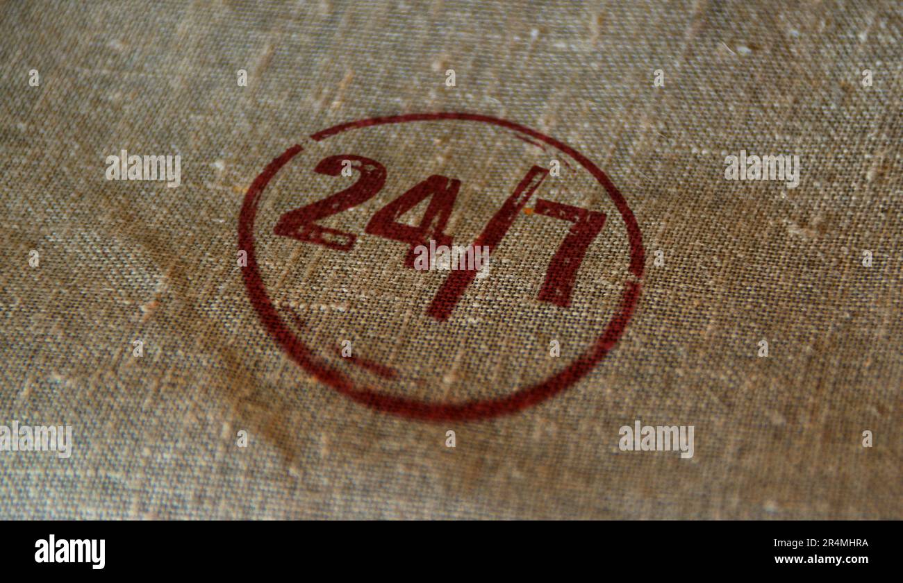 24 by 7 24 hour a day service stamp printed on linen sack. 24h round ...