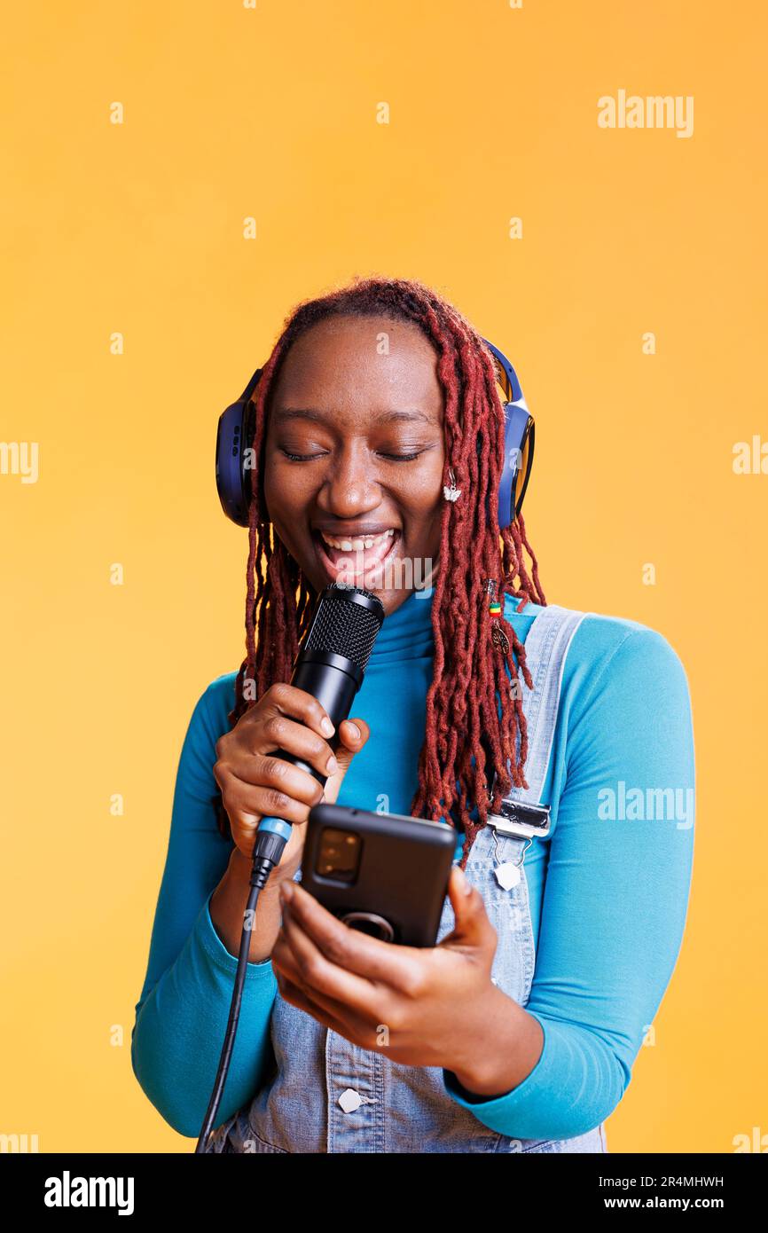 Singer creating musical performance live Stock Photo - Alamy