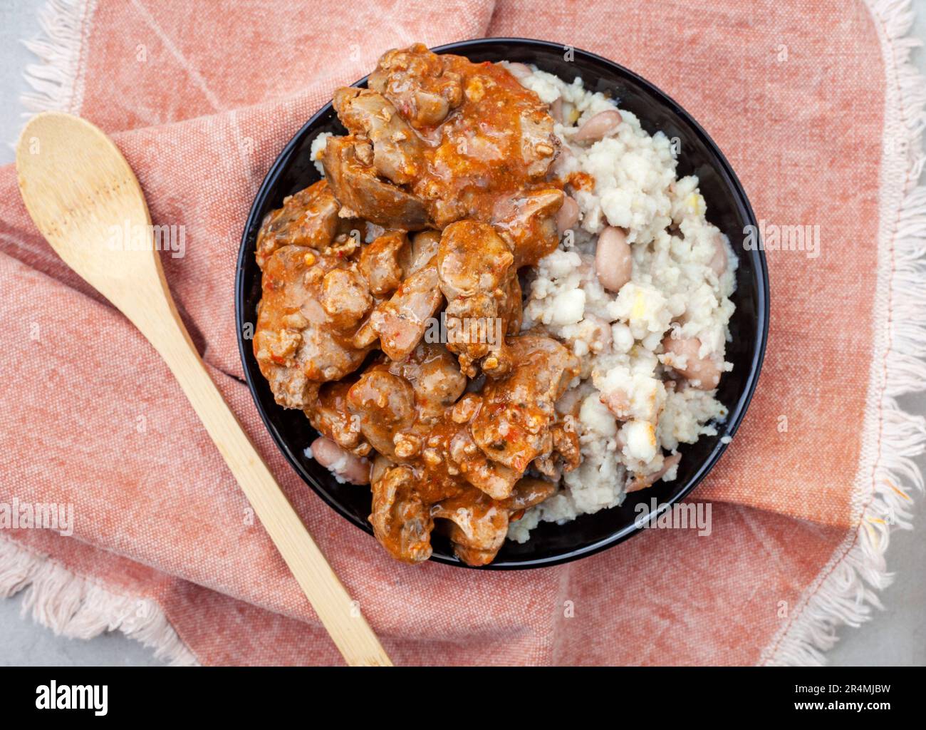 Traditional South African Peri Peri chicken livers with samp and beans ...