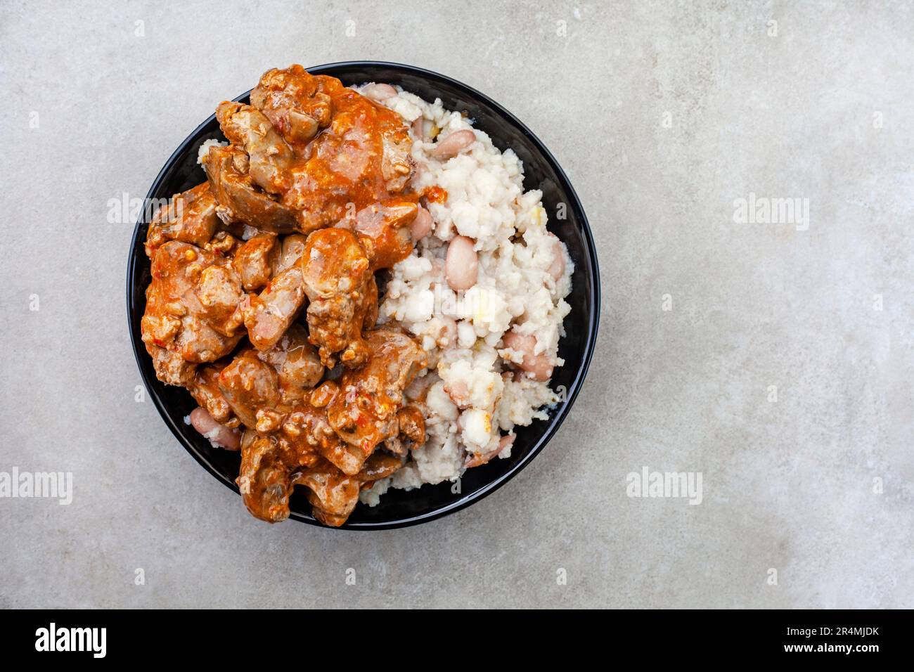 Traditional South African Peri Peri chicken livers with samp and beans ...