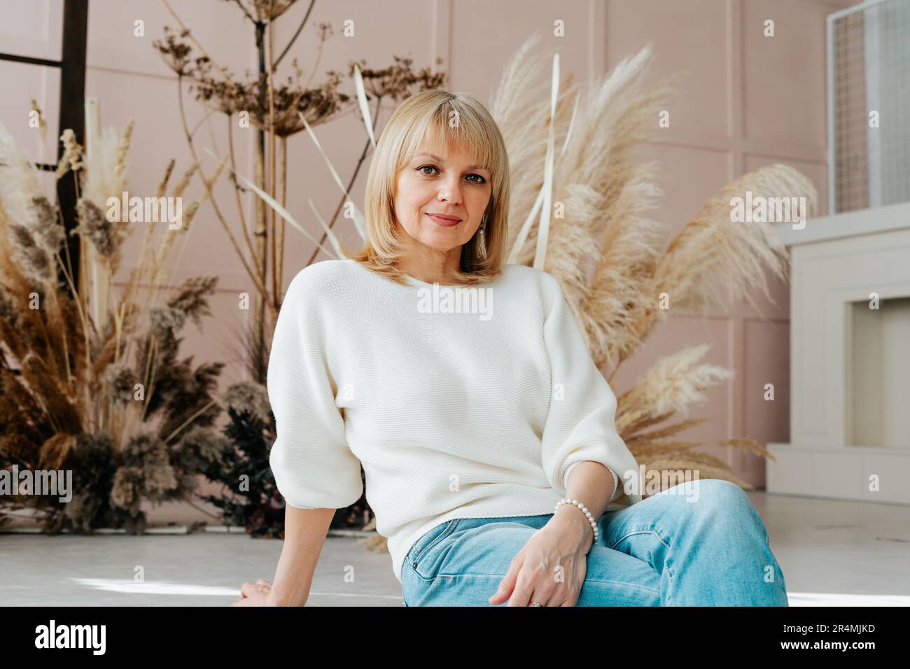 Senior female in sweater hi-res stock photography and images - Alamy