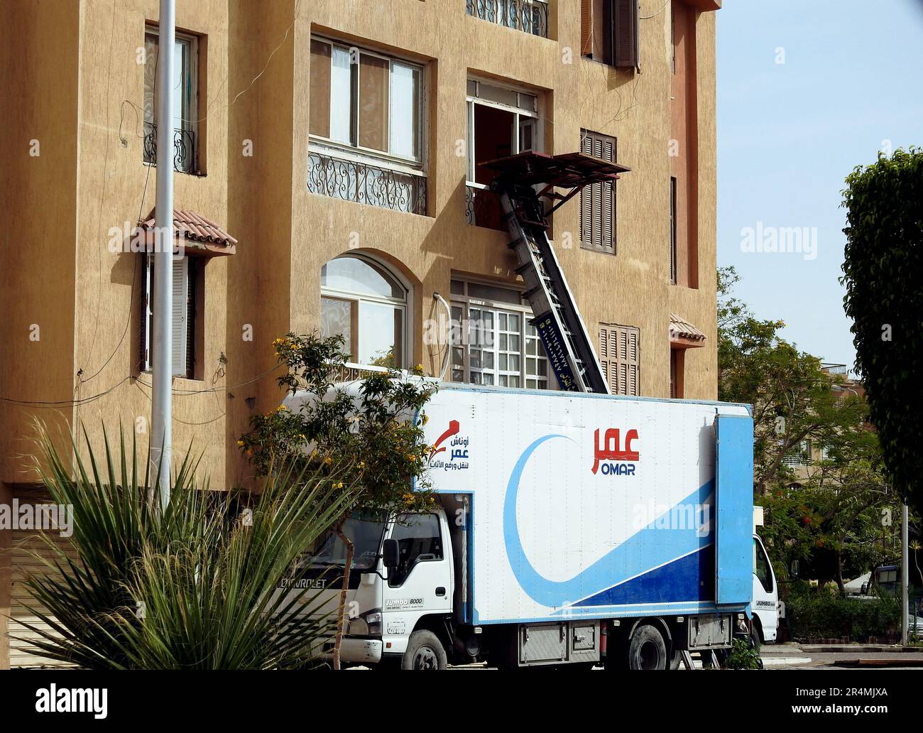 Cairo, Egypt, May 11 2023: Electric lifting winch vehicle for furniture ...