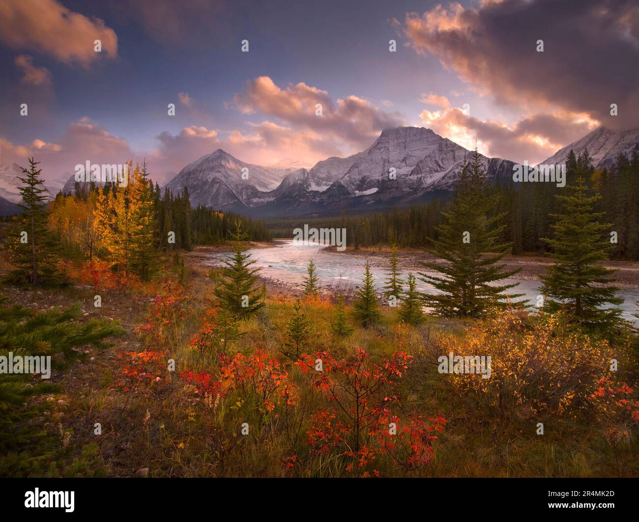 Beautiful fall colors complimented by the cool blue glacial waters of ...