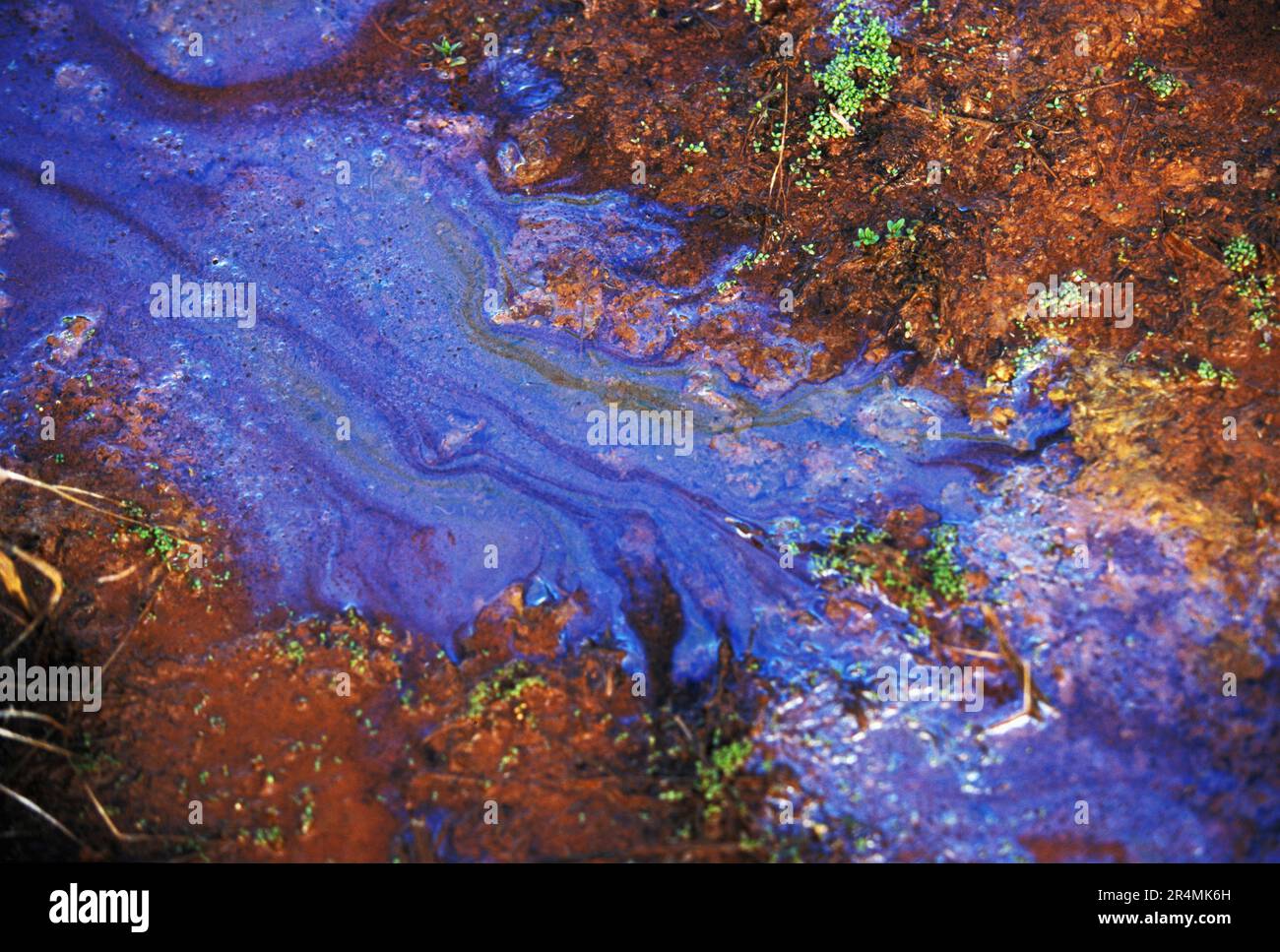 Oily water at the abandoned lead zinc silver Elsa Mine, Elsa, Yukon ...