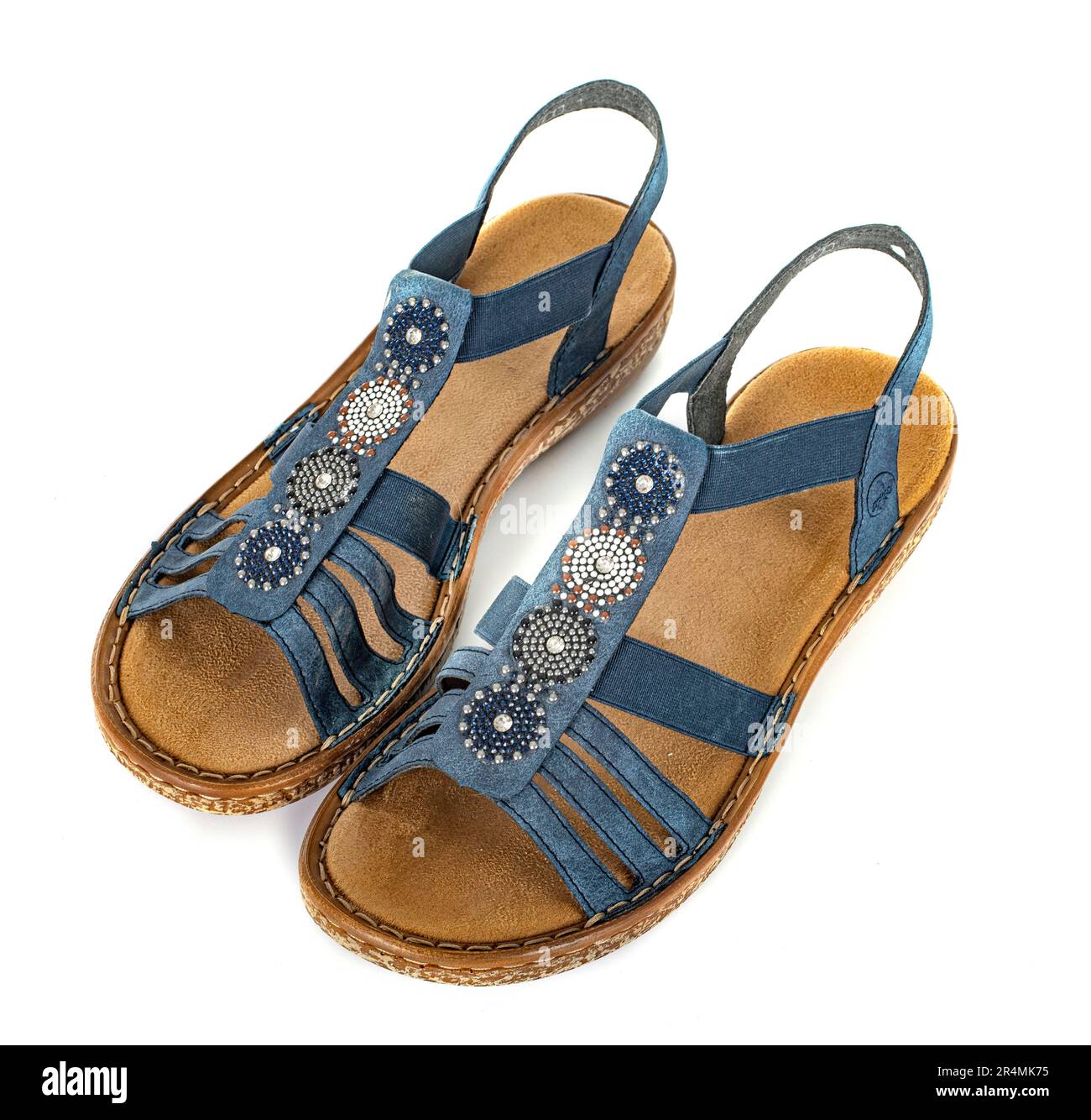 Leather women sandals in front of white background Stock Photo - Alamy