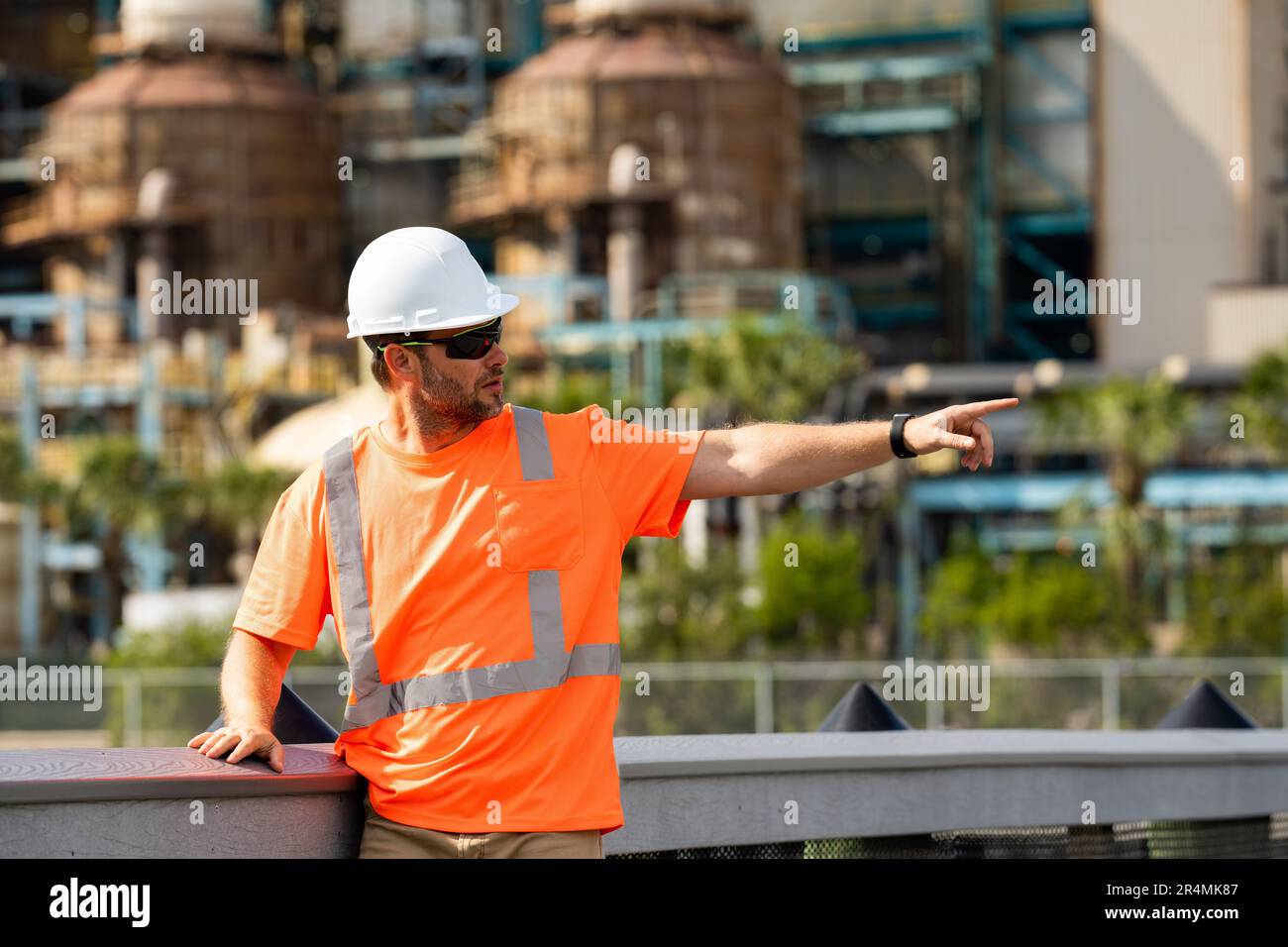 Professional heavy industry engineer worker man in safety uniform and ...