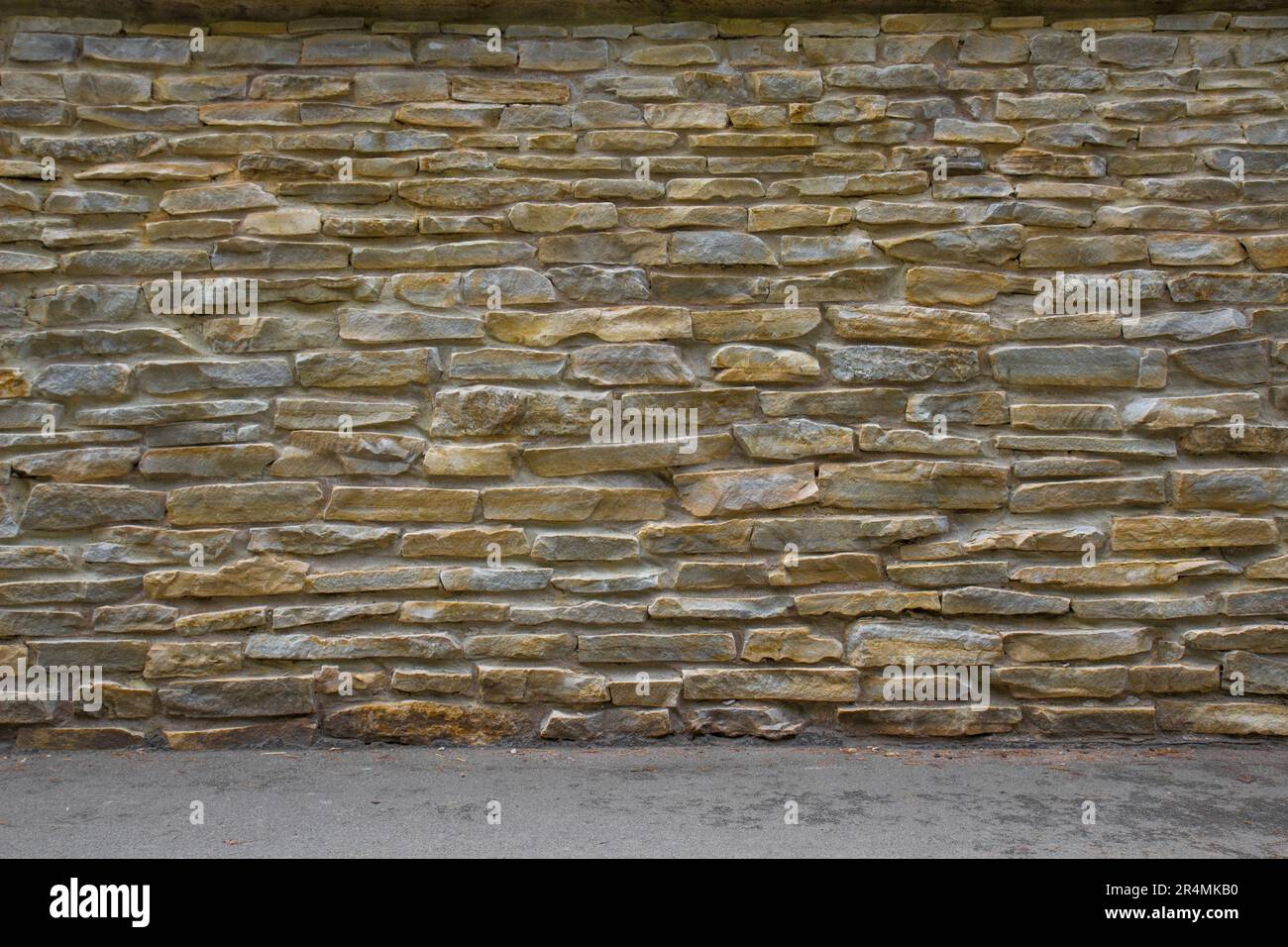 Light brown brick wall background with irregular pattern texture ...