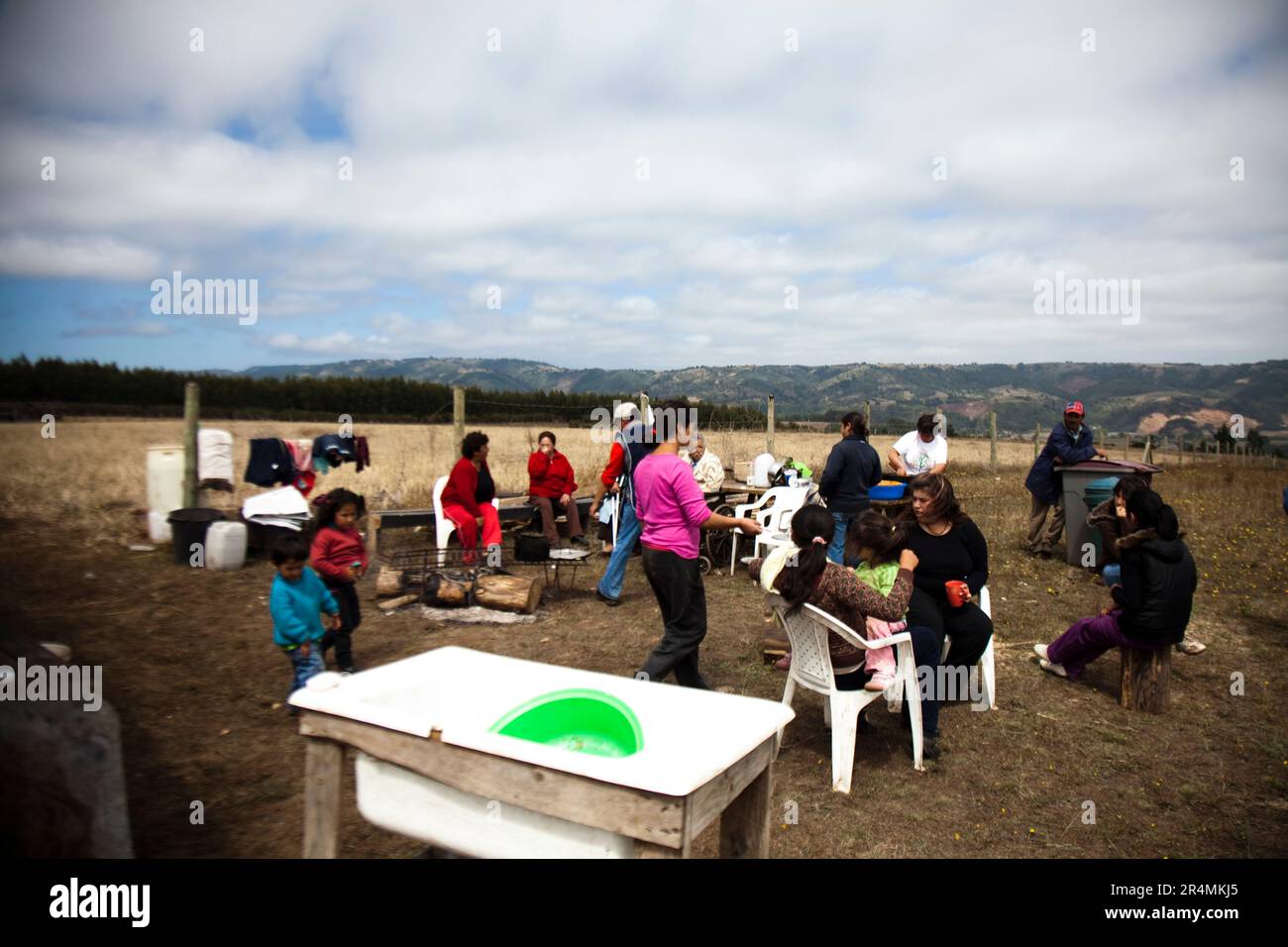 Local Chilean people gather outdoors, and attempt to resume normal life ...