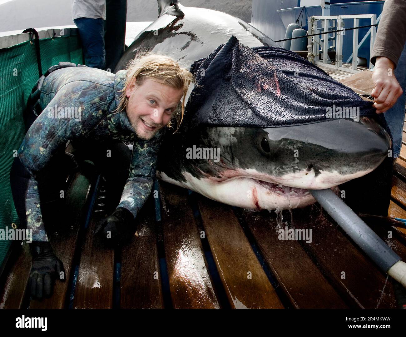 Expedition Great White crew member David Olsen smiles with his white ...