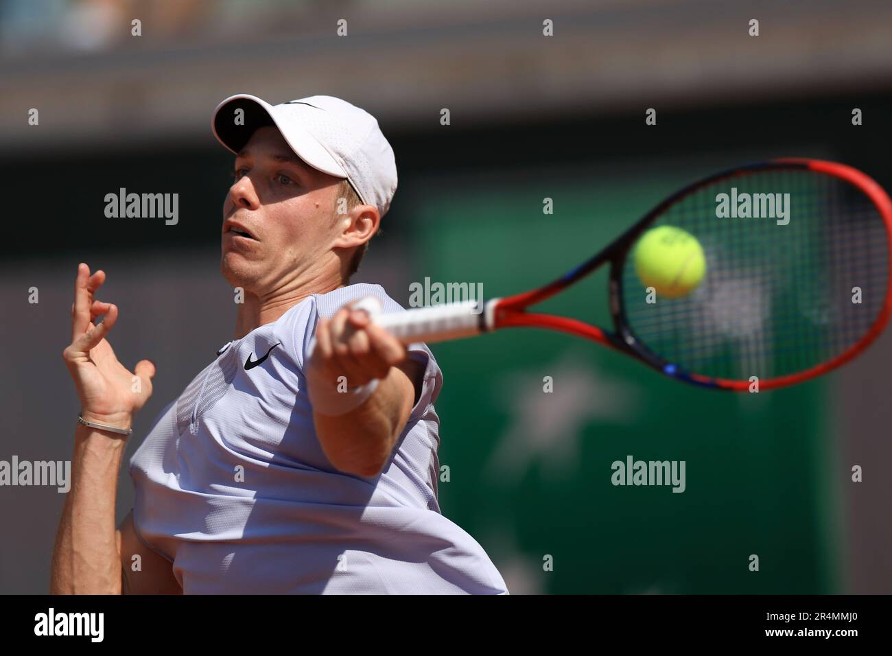 Canada's Denis Shapovalov plays a shot against Brandon Nakashima of the ...