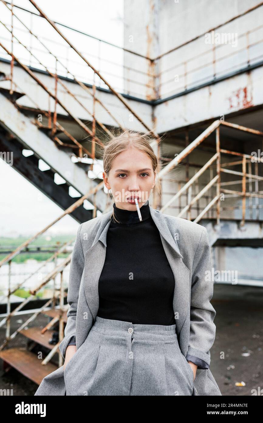 Smoking blonde woman hi-res stock photography and images - Alamy