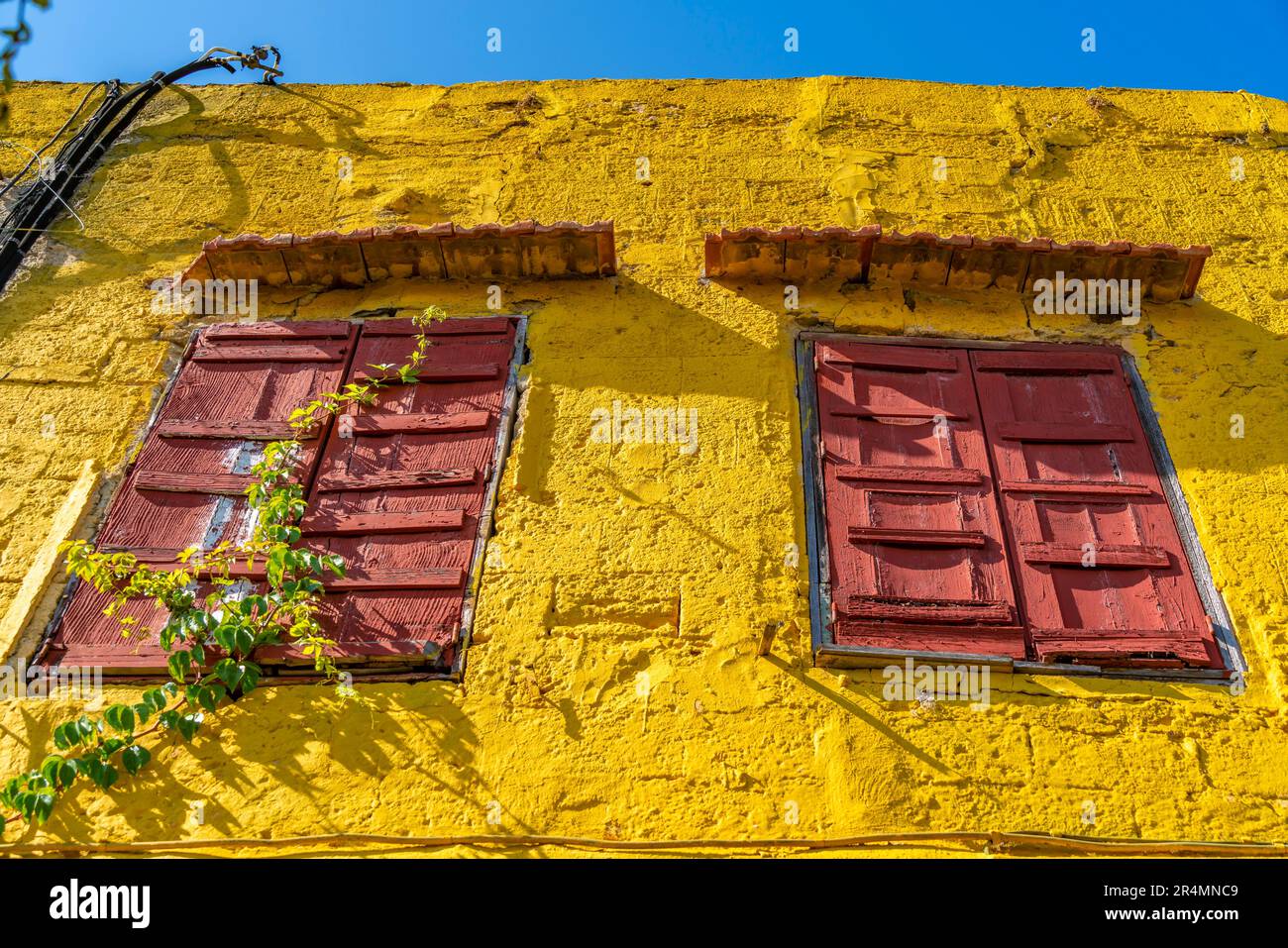 View of colourful building and shuttered windows, Old Rhodes Town ...