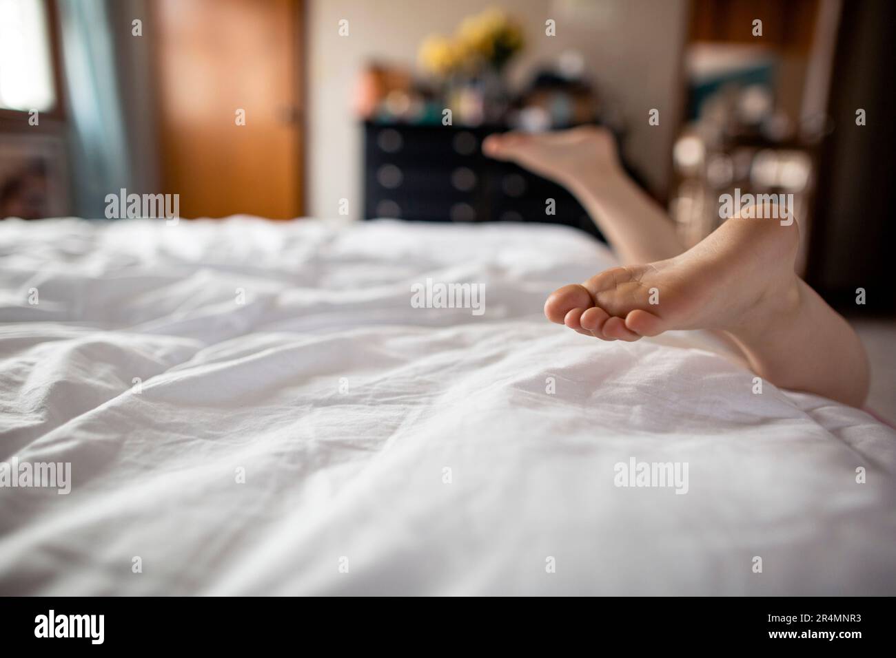 Sliding off bed hi-res stock photography and images - Alamy