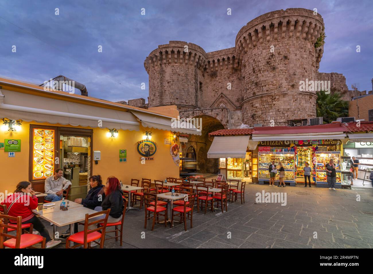 View of Sea Gate at dusk, Old Rhodes Town, UNESCO World Heritage Site ...