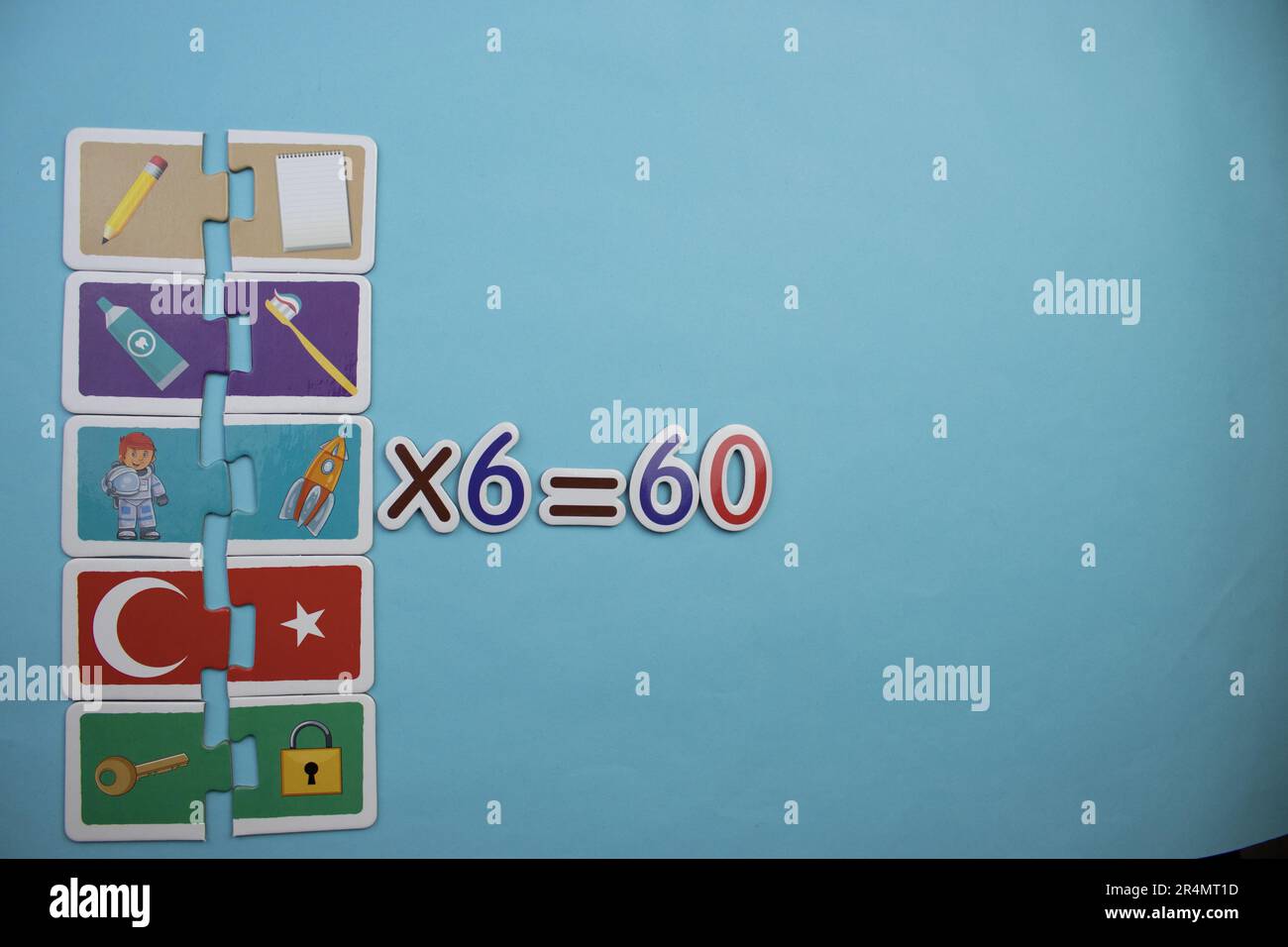 Ten jigsaw puzzles times six equals sixty operations, photographed from ...