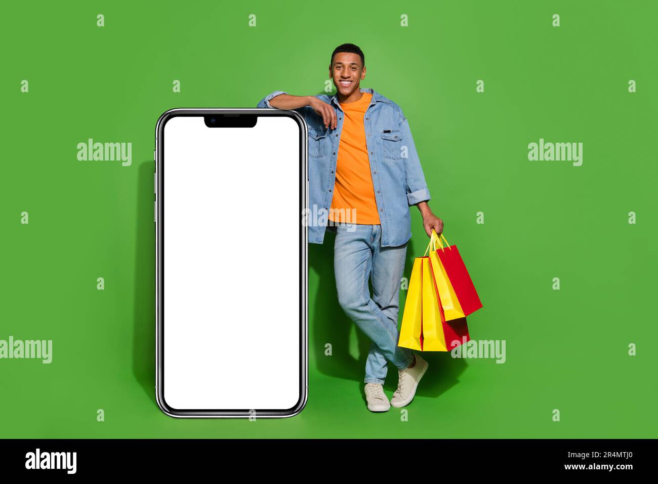 Full body photo of good mood man lean on long smartphone display ...