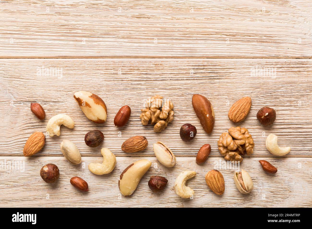 Composition of nuts , flat lay - mix hazelnuts, cashews, almonds on ...