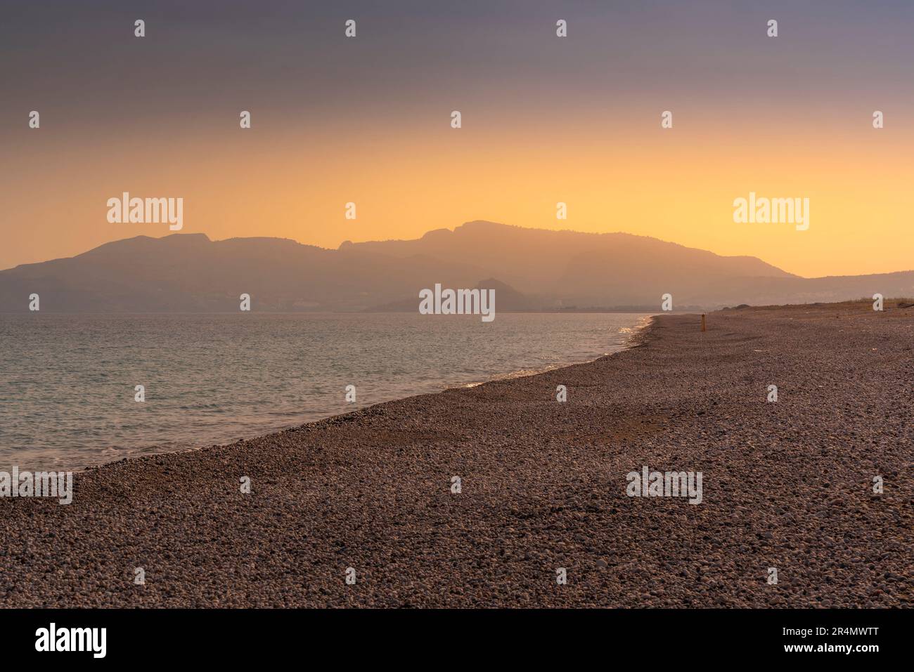 View of Paralia Massari Beach and Lindos in background, Rhodes ...
