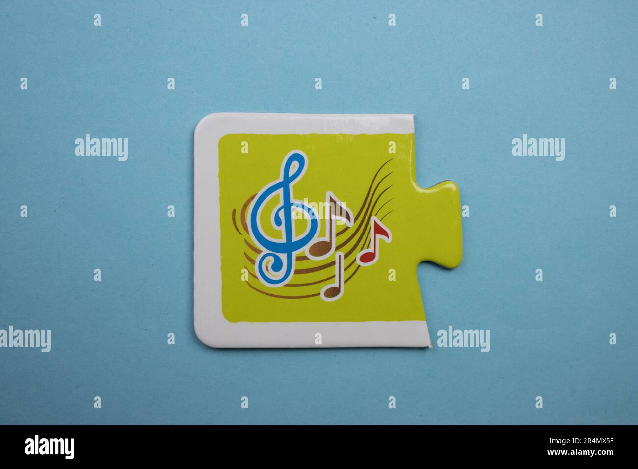 Picture puzzles superimposed on a blue background. Left key, musical ...