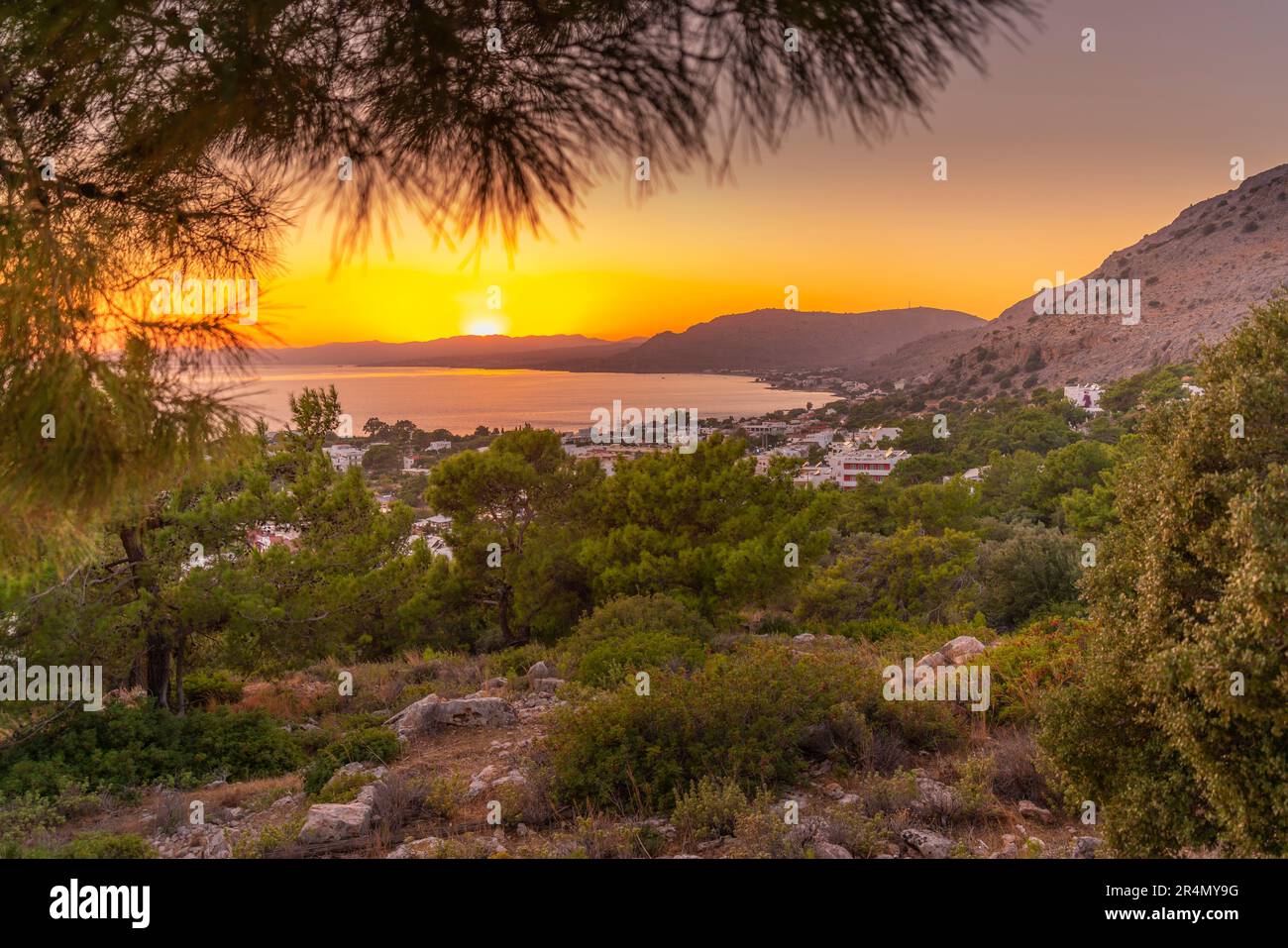 View of Pefki and coastline from elevated position at sunset, Pefki ...