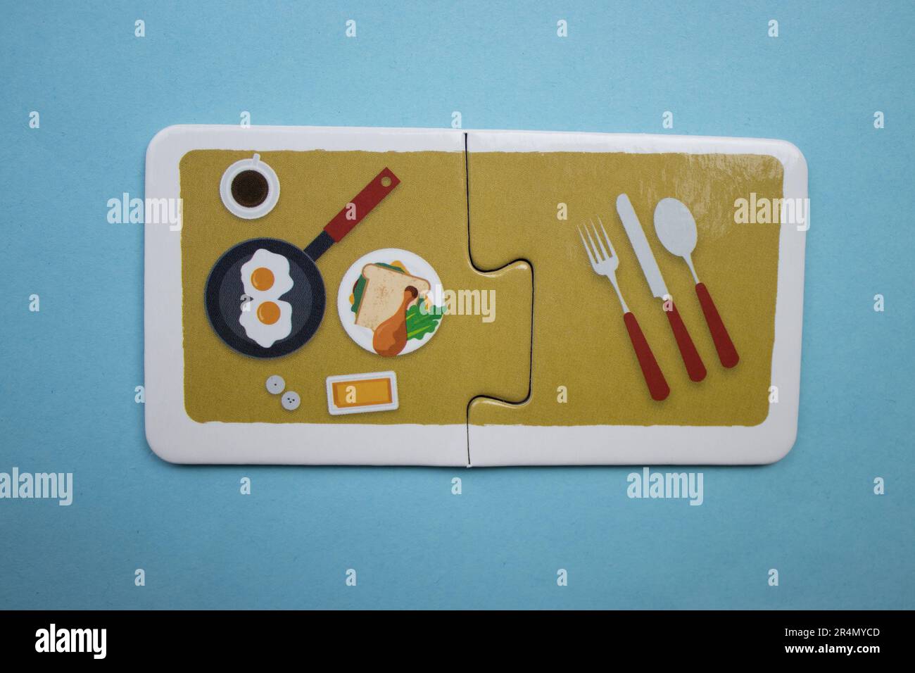 Picture puzzles placed on a blue background. Breakfast set Stock Photo ...
