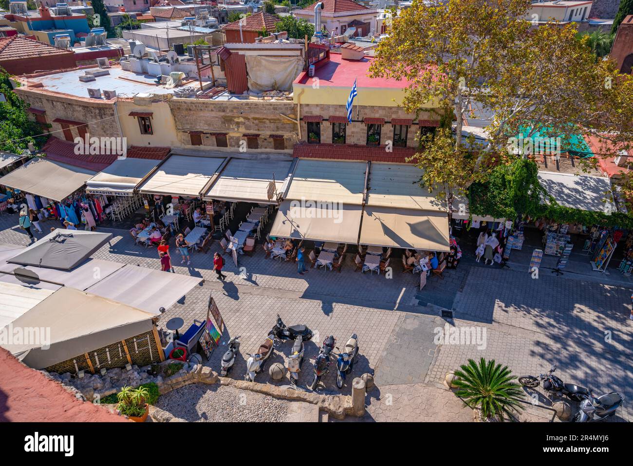 View of bars and restaurants from elevated position, Rhodes Old Town ...