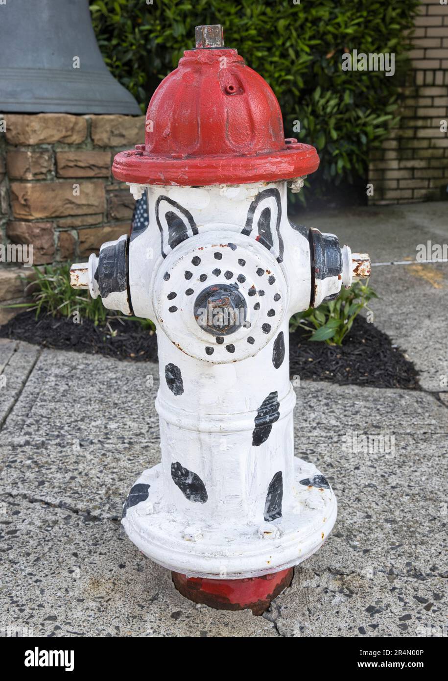 Fire hydrant painted as Dalmatian dog Stock Photo - Alamy