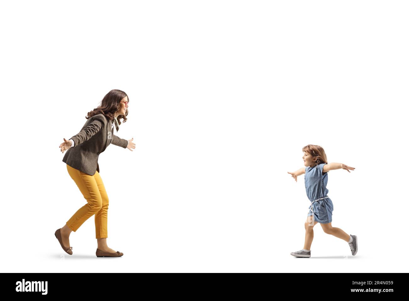 Girl spreading arms and running towards a young woman isolated on white ...