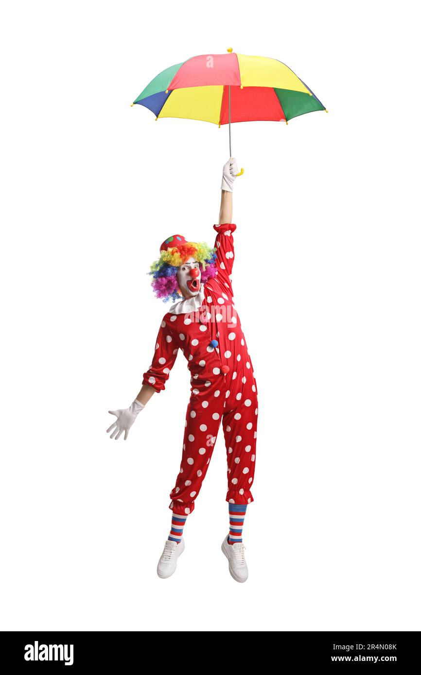 Confused clown flying with an umbrella isolated on white background ...