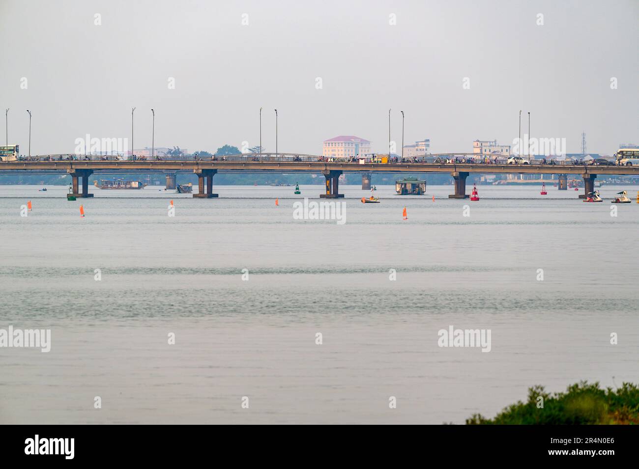 Traffic going across the Phu Xuan Bridge and on the Perfume River in ...