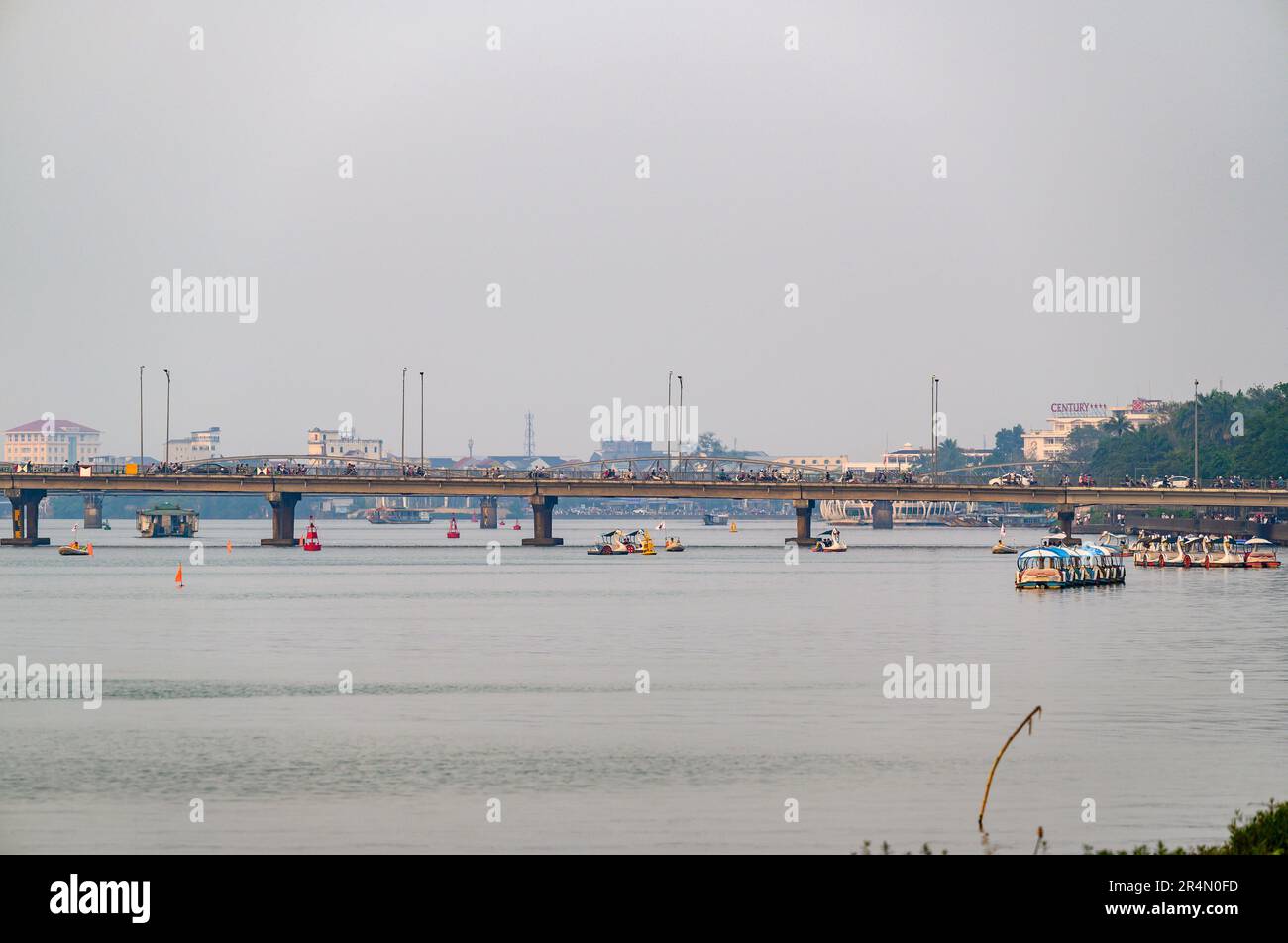 Traffic going across the Phu Xuan Bridge and on the Perfume River in ...