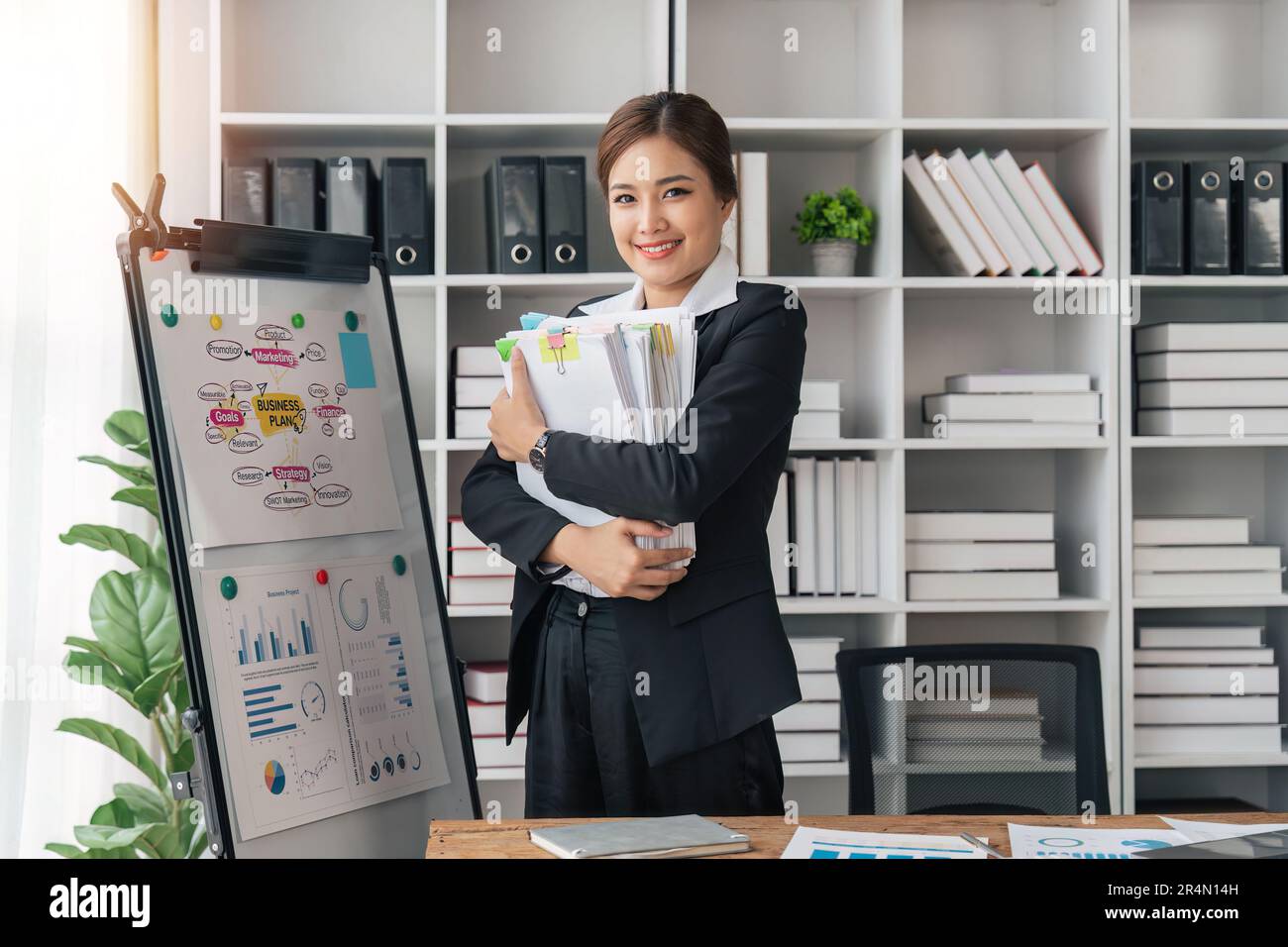 woman hands working in stacks of paper files document achieves on ...