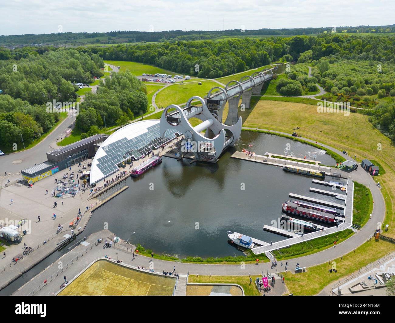 Aerial view from drone of Falkirk Wheel rotating boat lift on Forth and ...