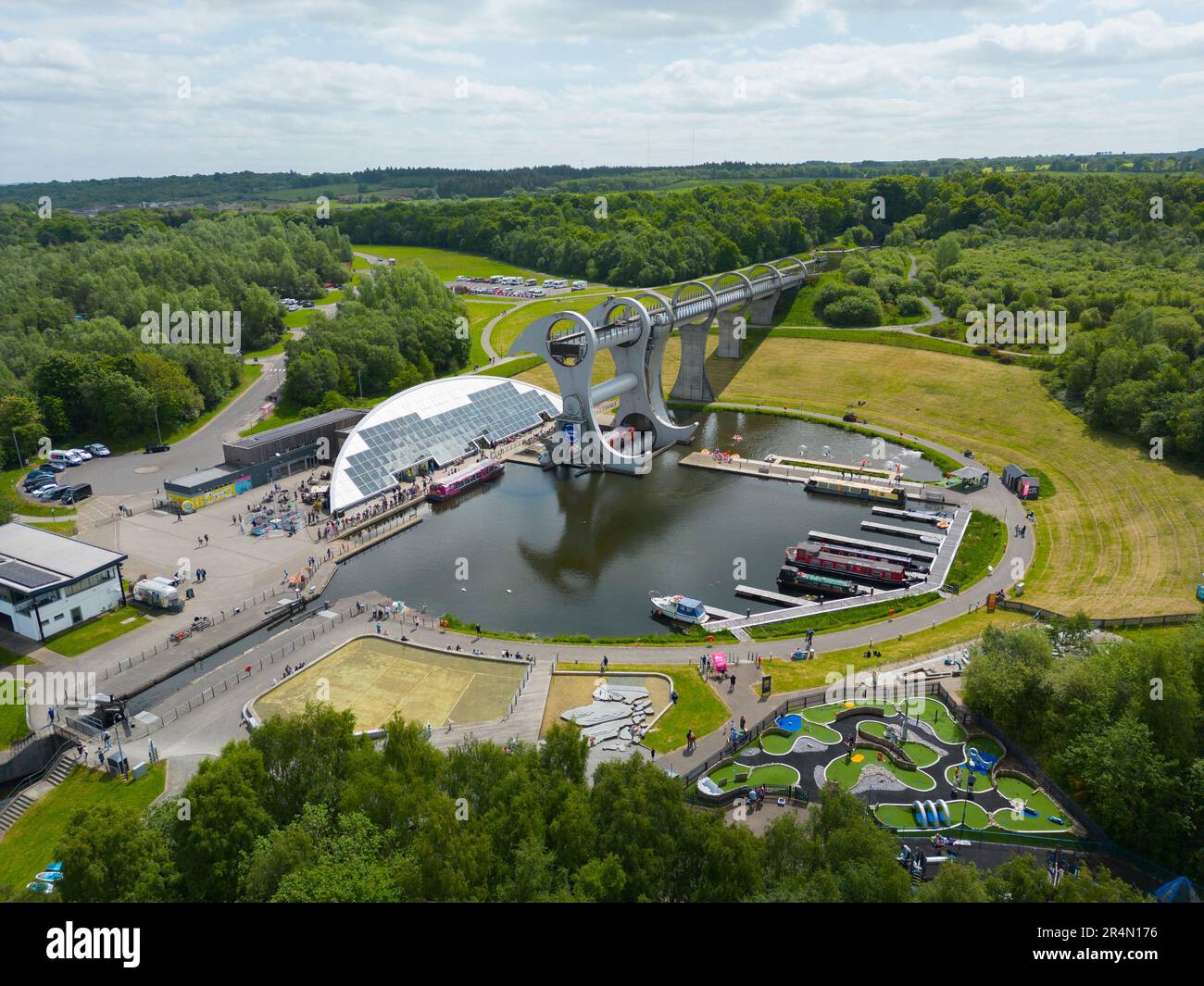 Aerial view from drone of Falkirk Wheel rotating boat lift on Forth and ...