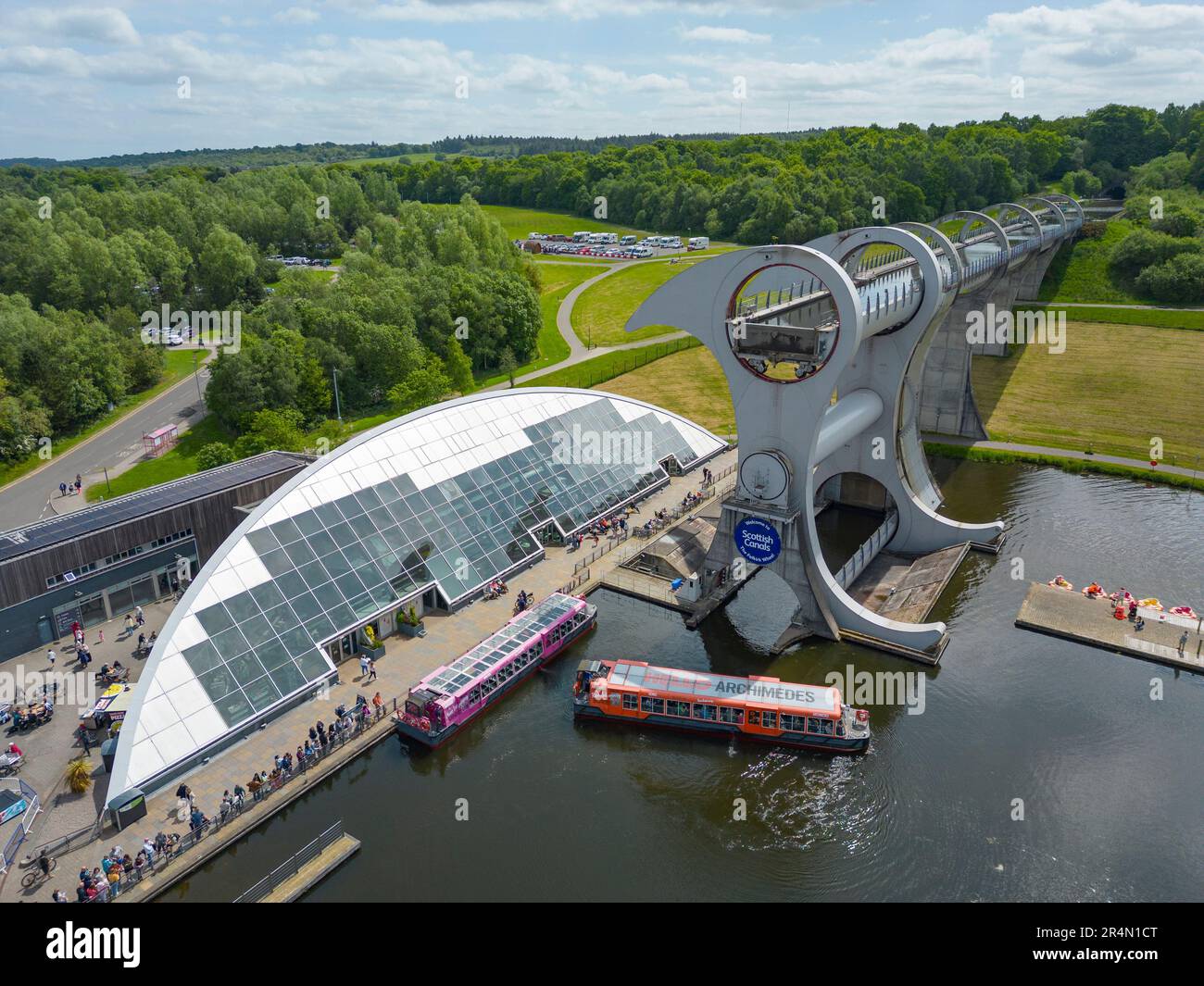Aerial view from drone of Falkirk Wheel rotating boat lift on Forth and ...